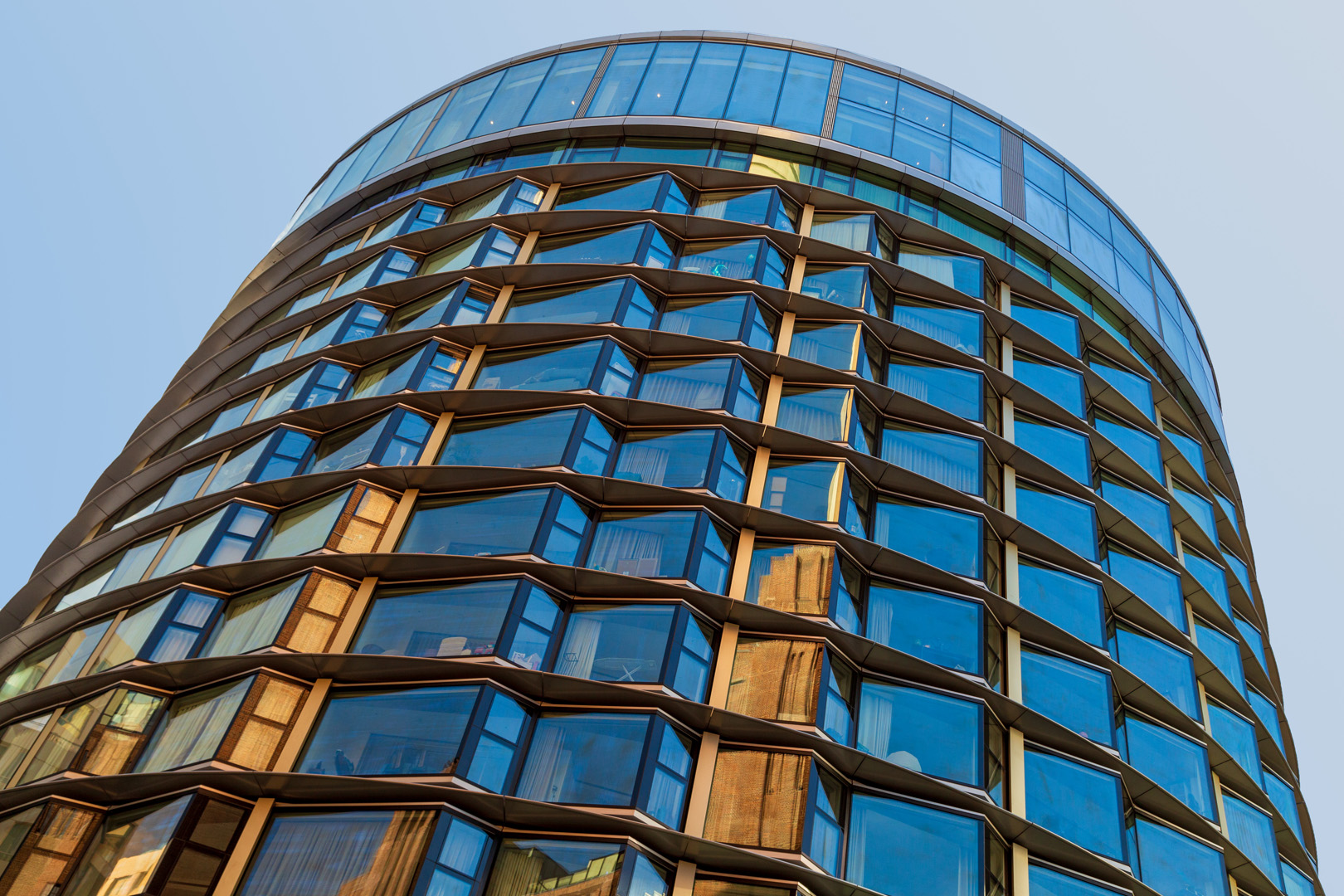 Gebrüder Schneider | Wave-shaped freeform facade for Battersea Roof ...