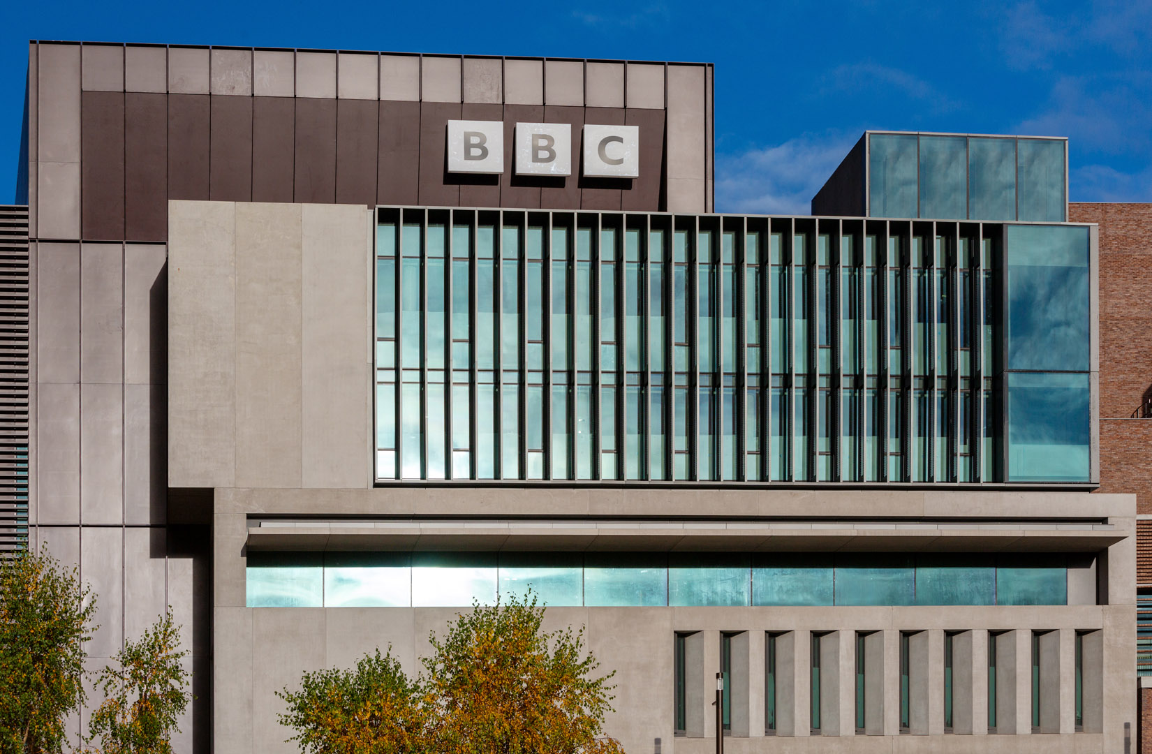 Gebrüder Schneider | Post-and-beam facades, steel roof and suspended metal facade for the BBC in ...